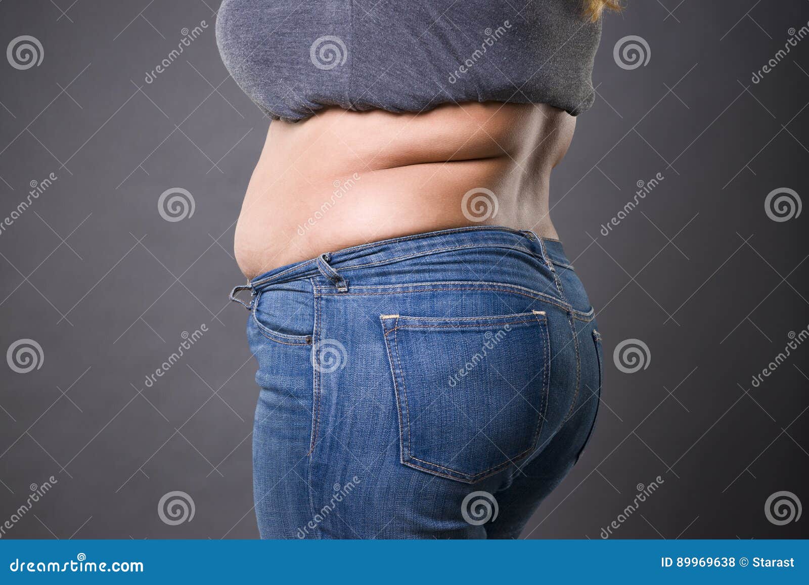 Woman With Fat Abdomen In Blue Jeans Overweight Female Stomach