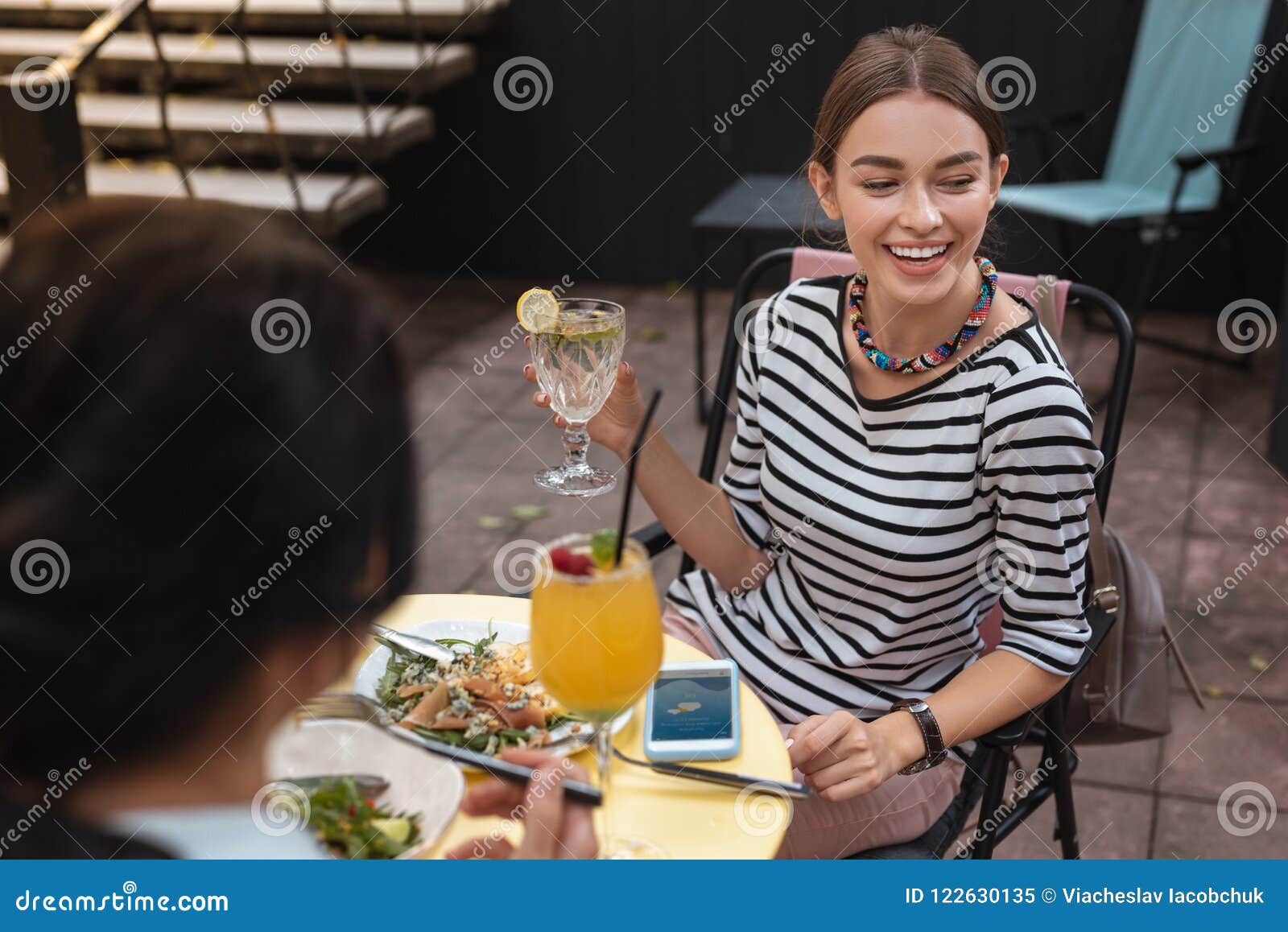 Woman Feeling Sentimental while Remembering Childhood with Sister Stock ... Woman Feeling Sentimental while Remembering Childhood with Sister Stock ...