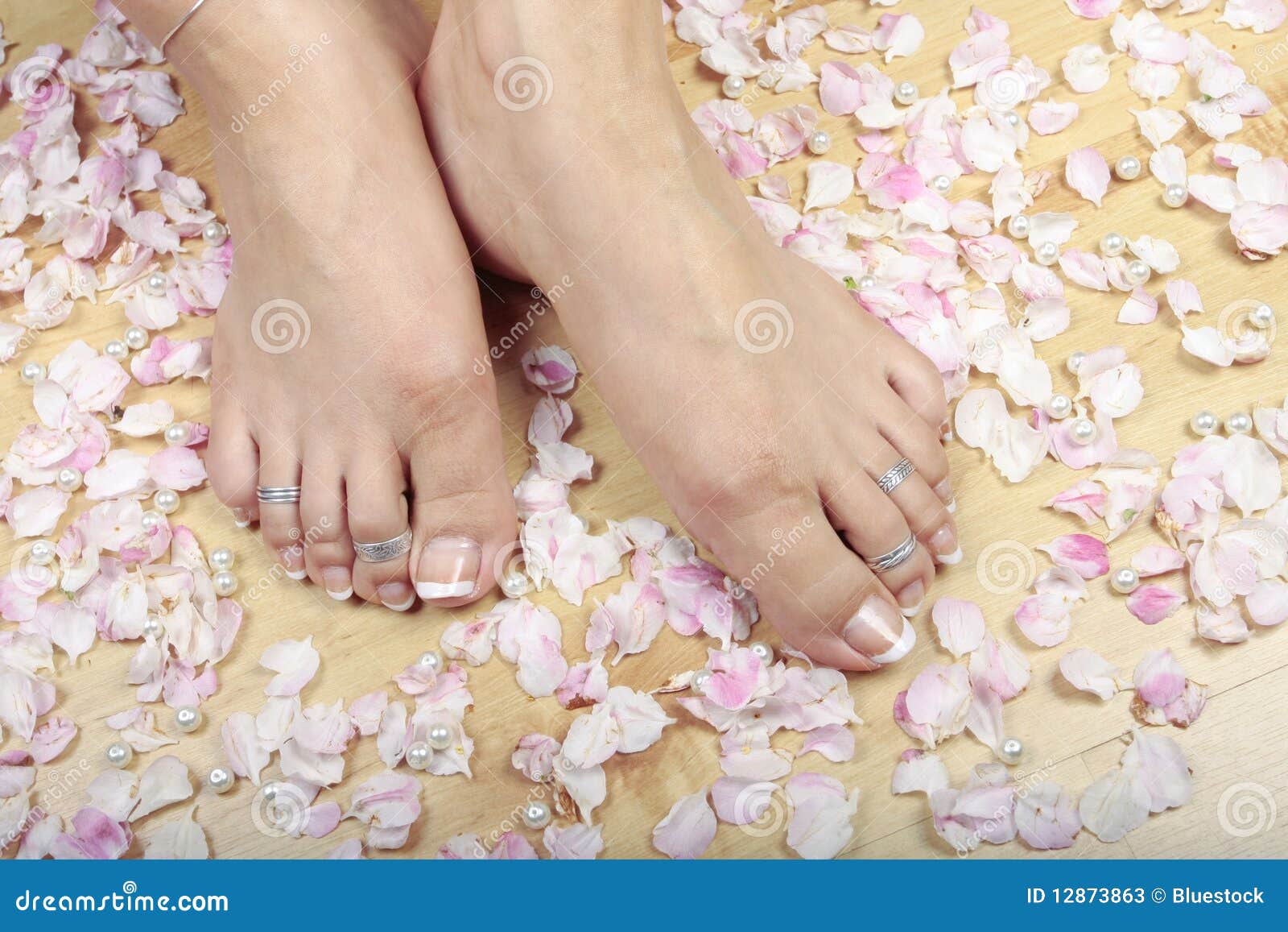 Woman feet and rose petals stock image. Image of sensual - 12873863