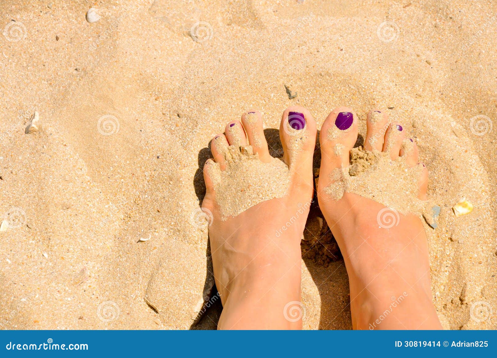Woman feet in sand stock photo. Image of leisure, legs - 30819414