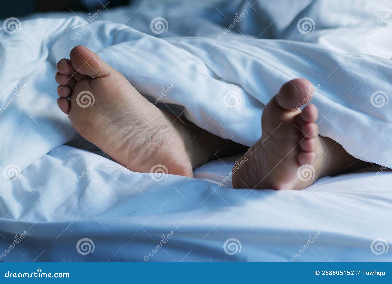 Woman Feet on the White Bed Stock Photo - Image of sleep, closeup ...