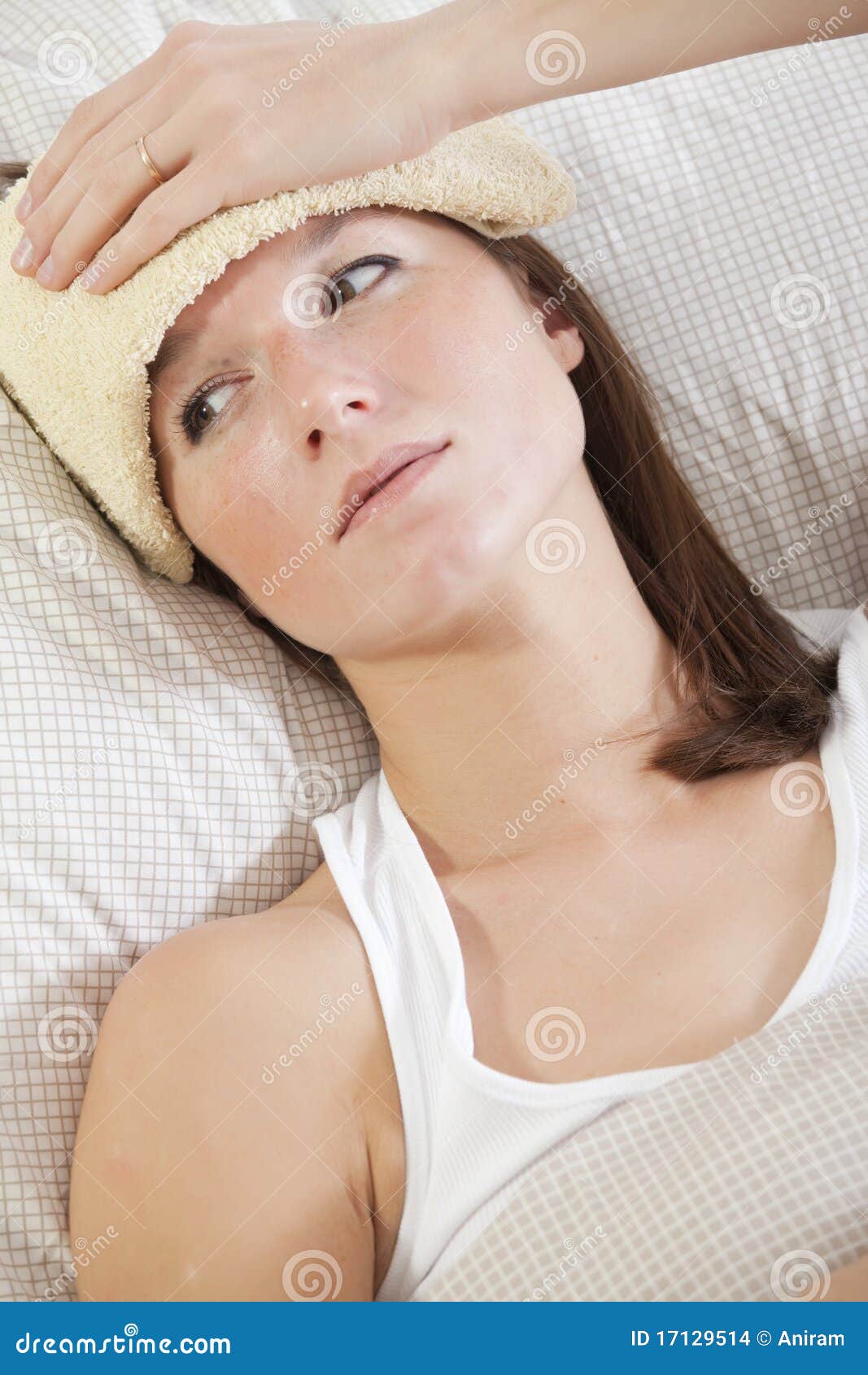 Woman with fever in bed stock photo. Image of lying, woman - 17129514