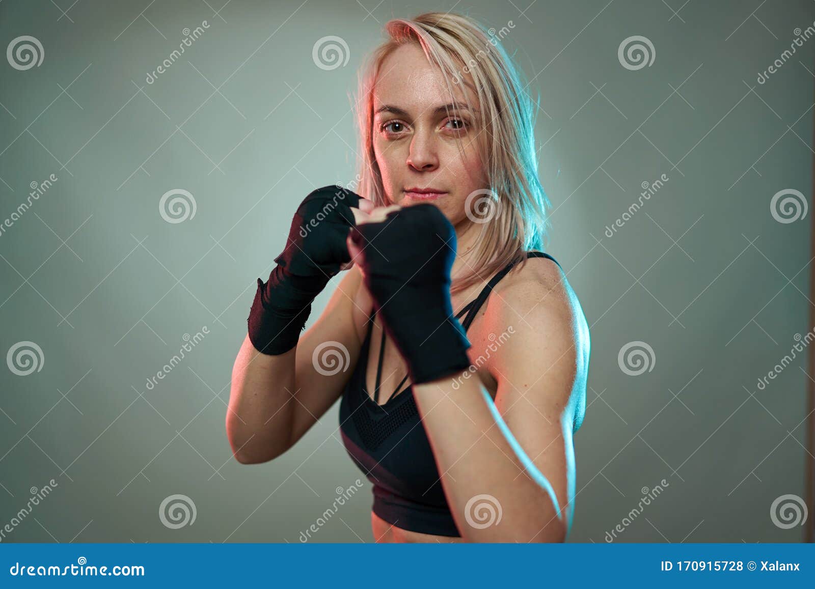 Woman doing shadow boxing stock photo. Image of boxer - 170915728