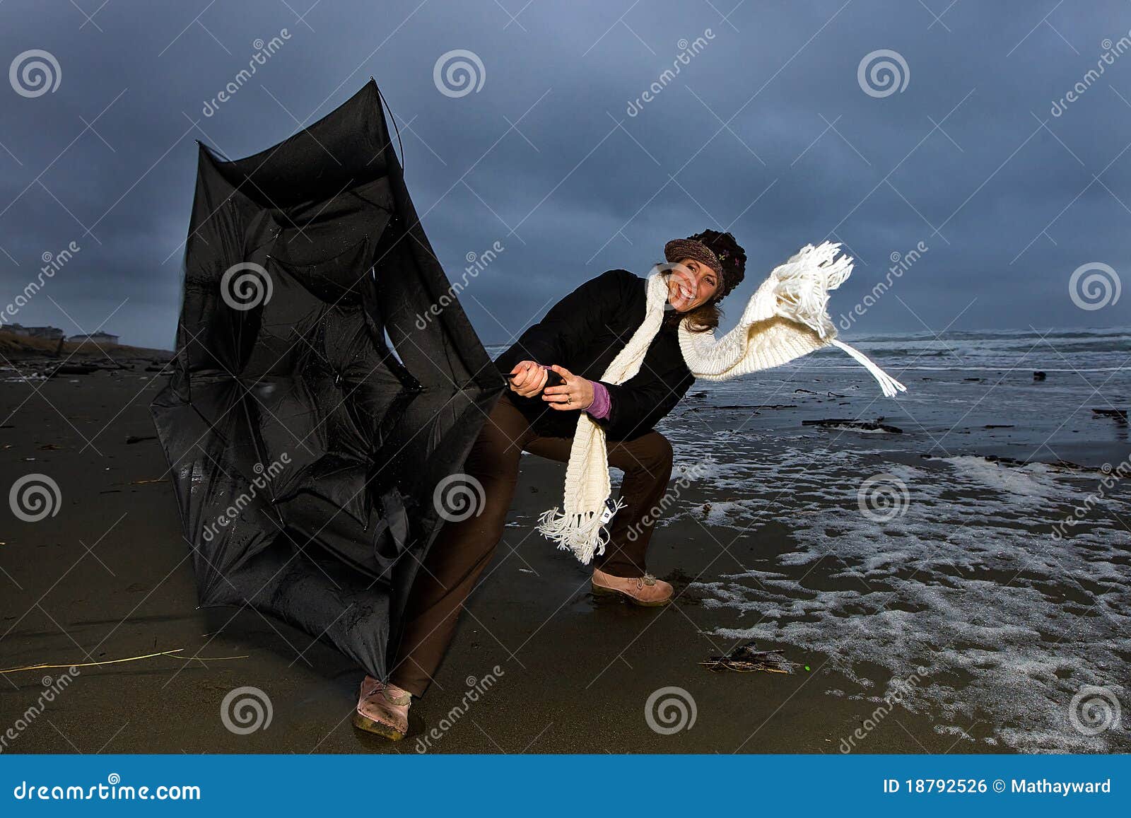 Woman fighting a storm stock photo. Image of fierce, beach - 18792526