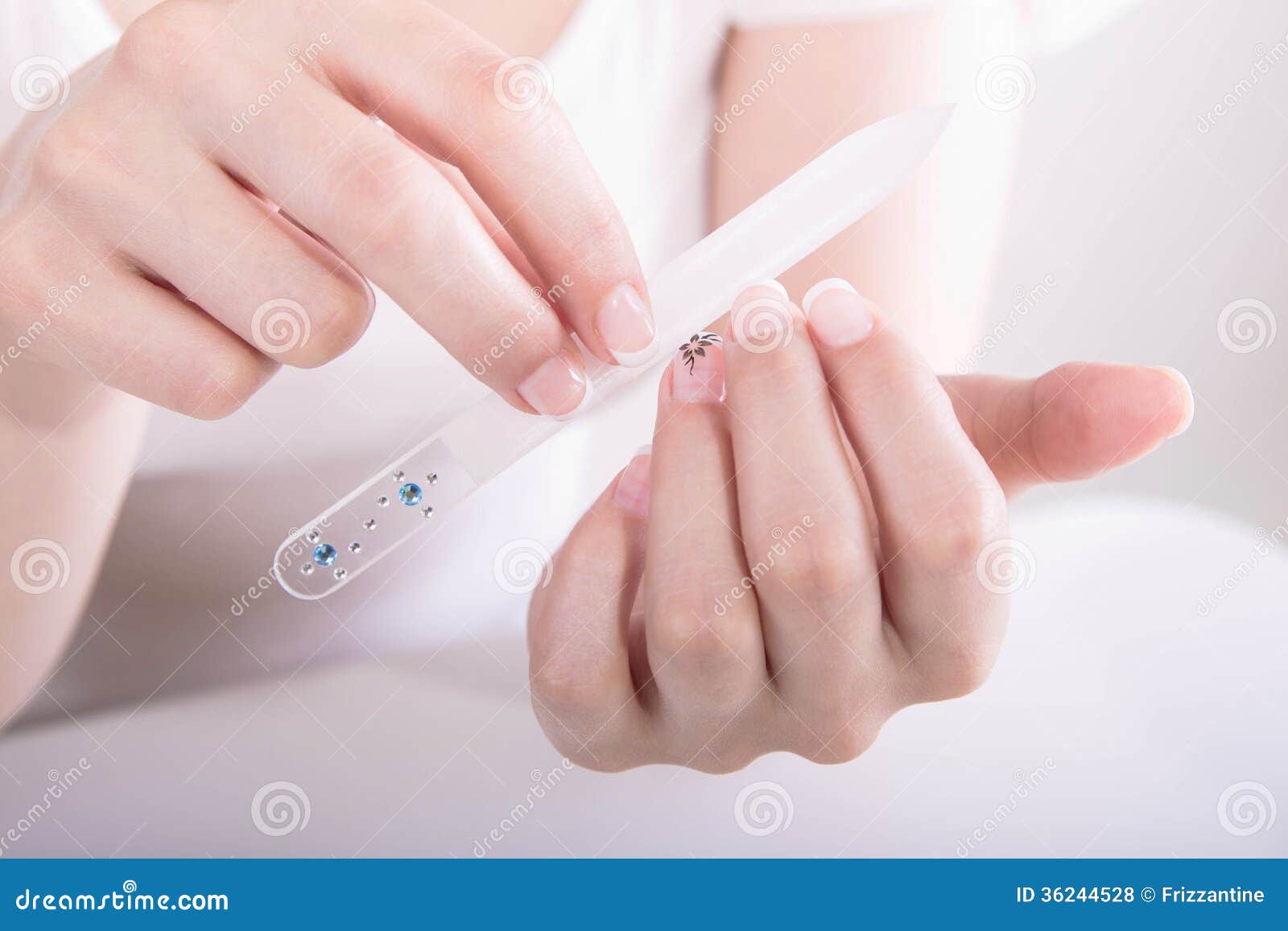 Woman filing her nails stock photo. Image of polish, french - 36244528