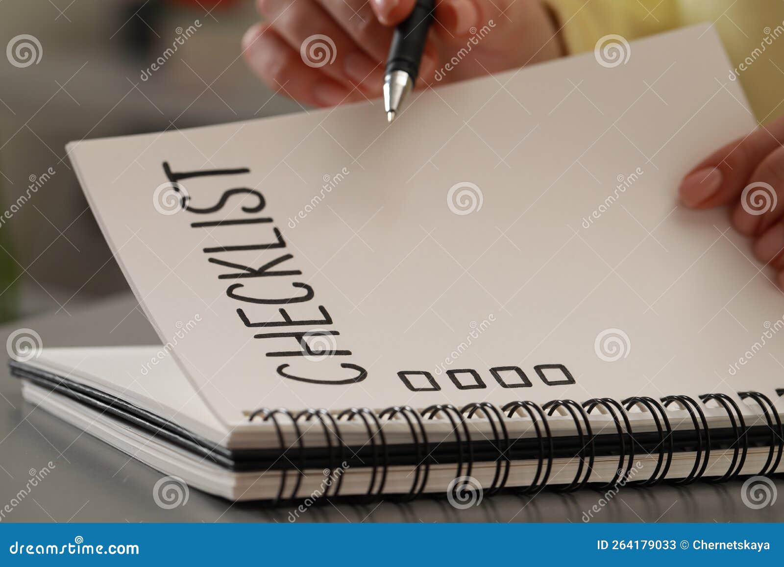 Woman Filling Checklist at Grey Table, Closeup Stock Image - Image of ...