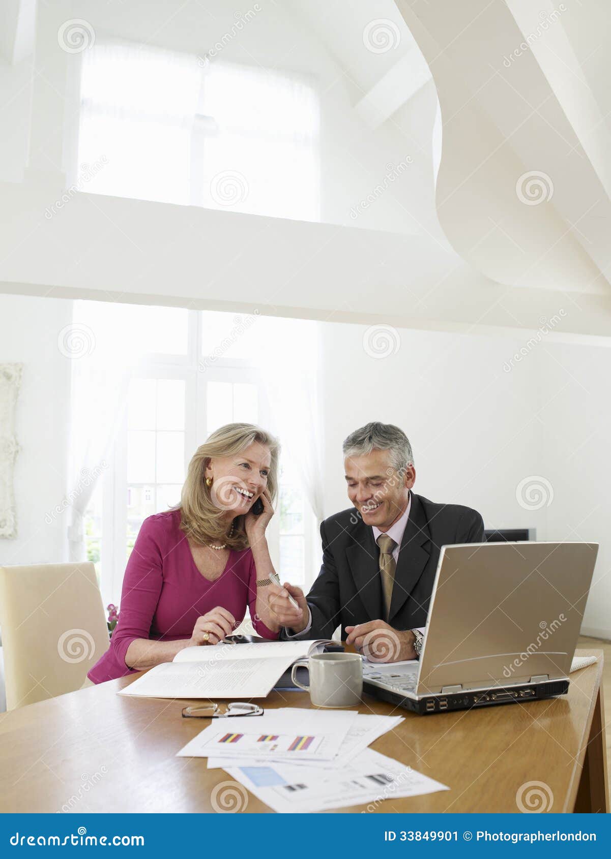 Woman with Financial Advisor at Table Stock Image - Image of adult ...