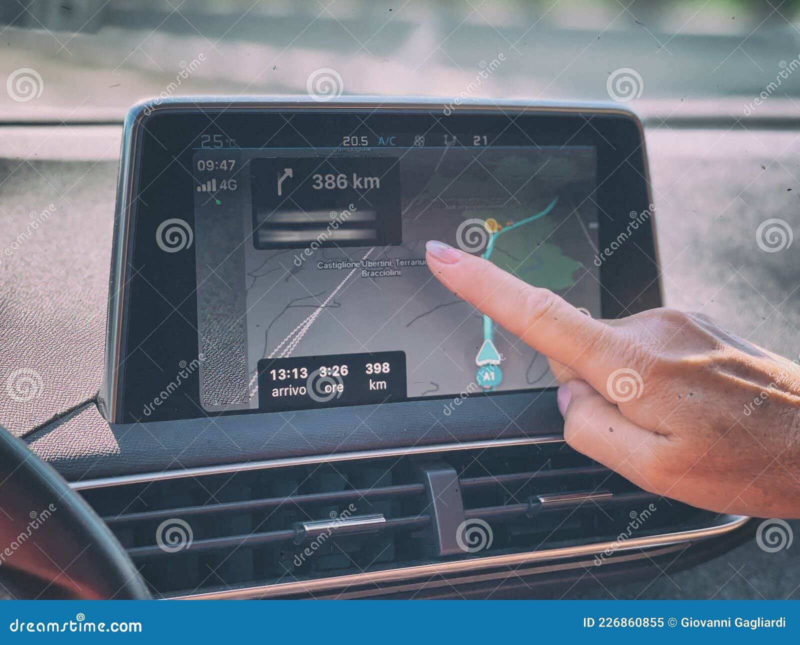 Woman Finger Using Navigation System while Driving a Car Stock Image ...