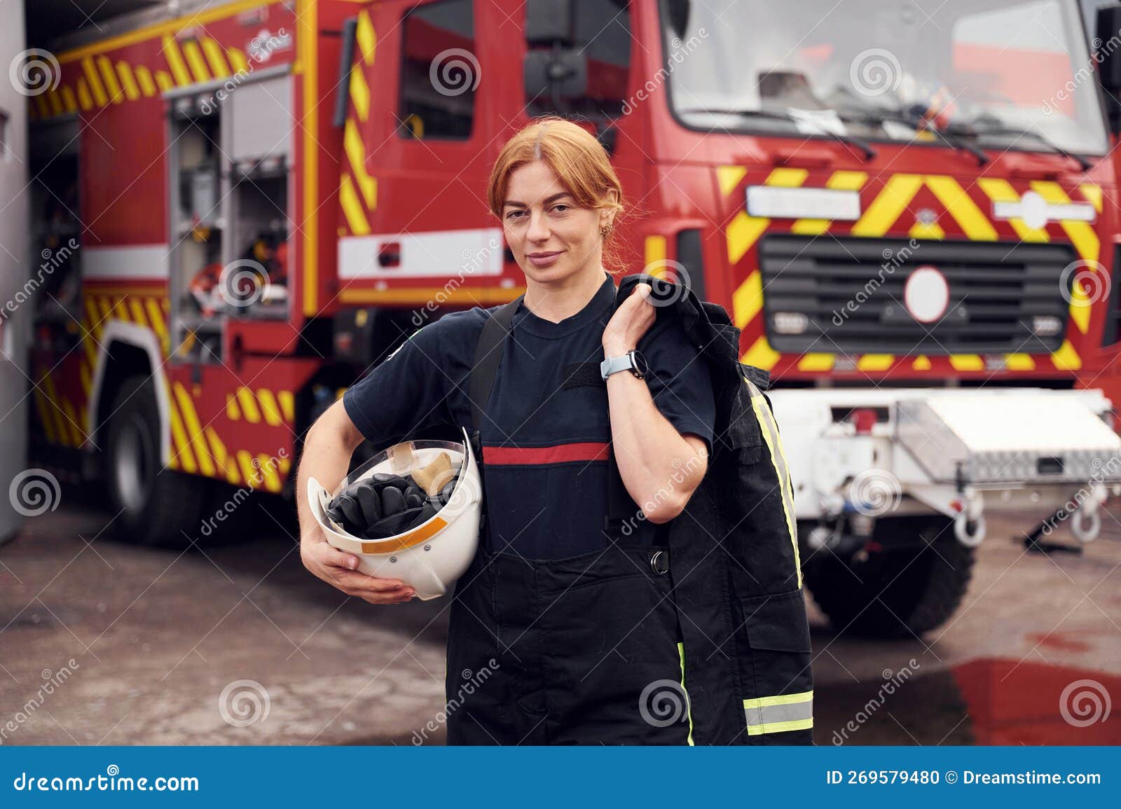 Woman Firefighter in Uniform is at Work in Department Stock Photo ...