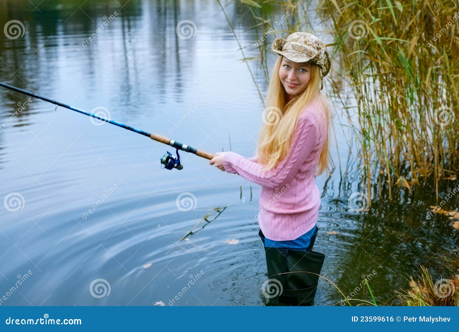 Woman Fishing stock photo. Image of autumn, fisherwoman - 23599616