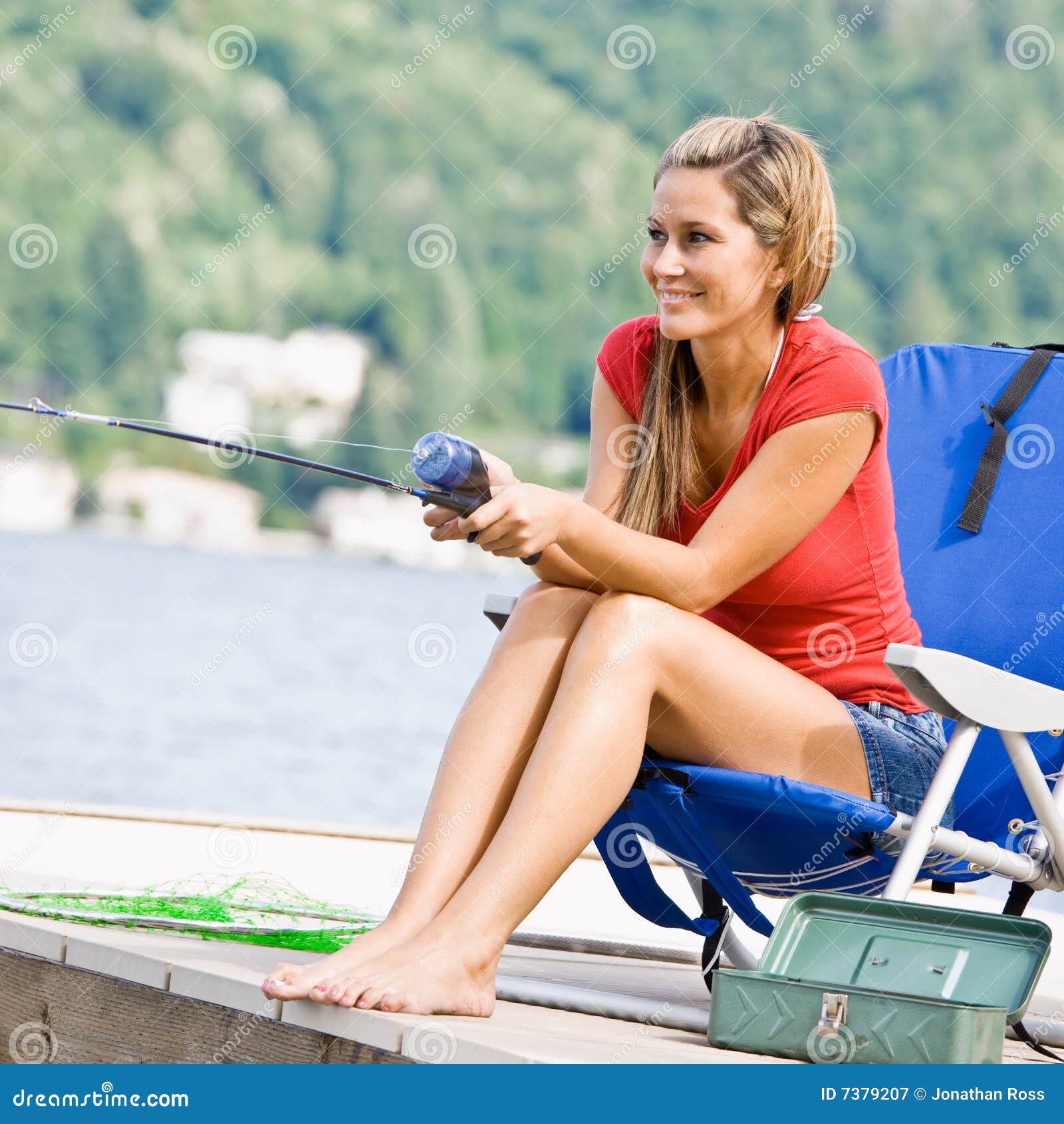 Woman fishing on pier stock image. Image of resting, activity - 7379207