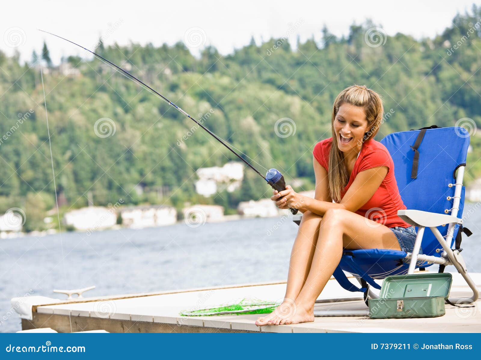 Woman fishing on pier stock image. Image of relaxation - 7379211