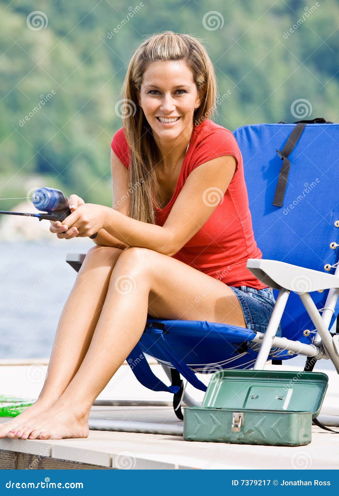 Woman fishing on pier stock image. Image of pier, fishing - 7379217