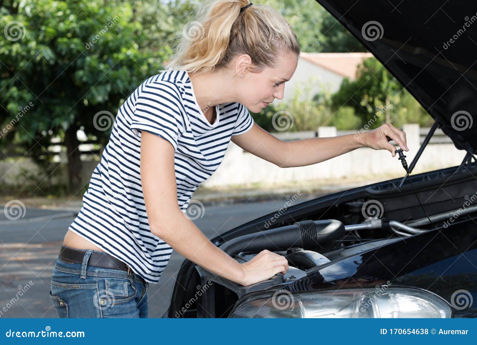 Woman fixing car alone stock photo. Image of beauty - 170654638