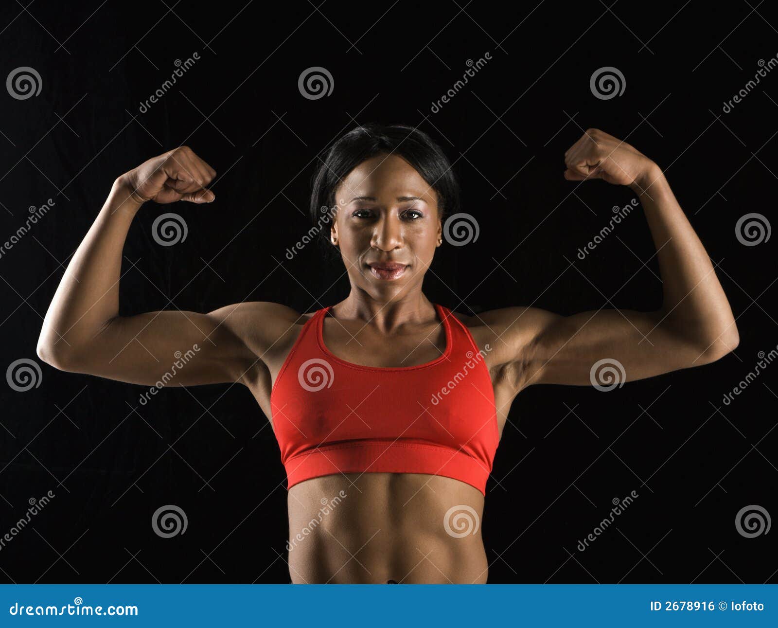 Woman flexing muscles. stock photo. Image of midriff, 070504a0124 - 2678916