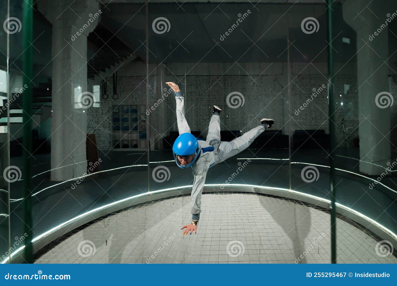 A Woman Flies in a Wind Tunnel. Free Fall Simulator. Stock Image ...