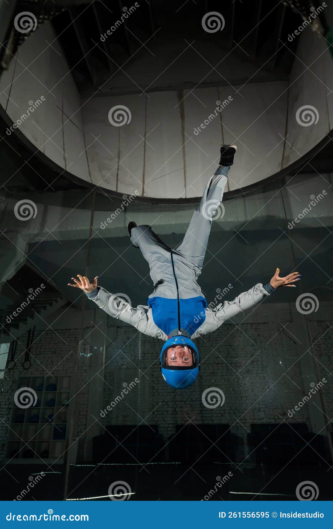 A Woman Flies in a Wind Tunnel. Free Fall Simulator. Stock Image ...