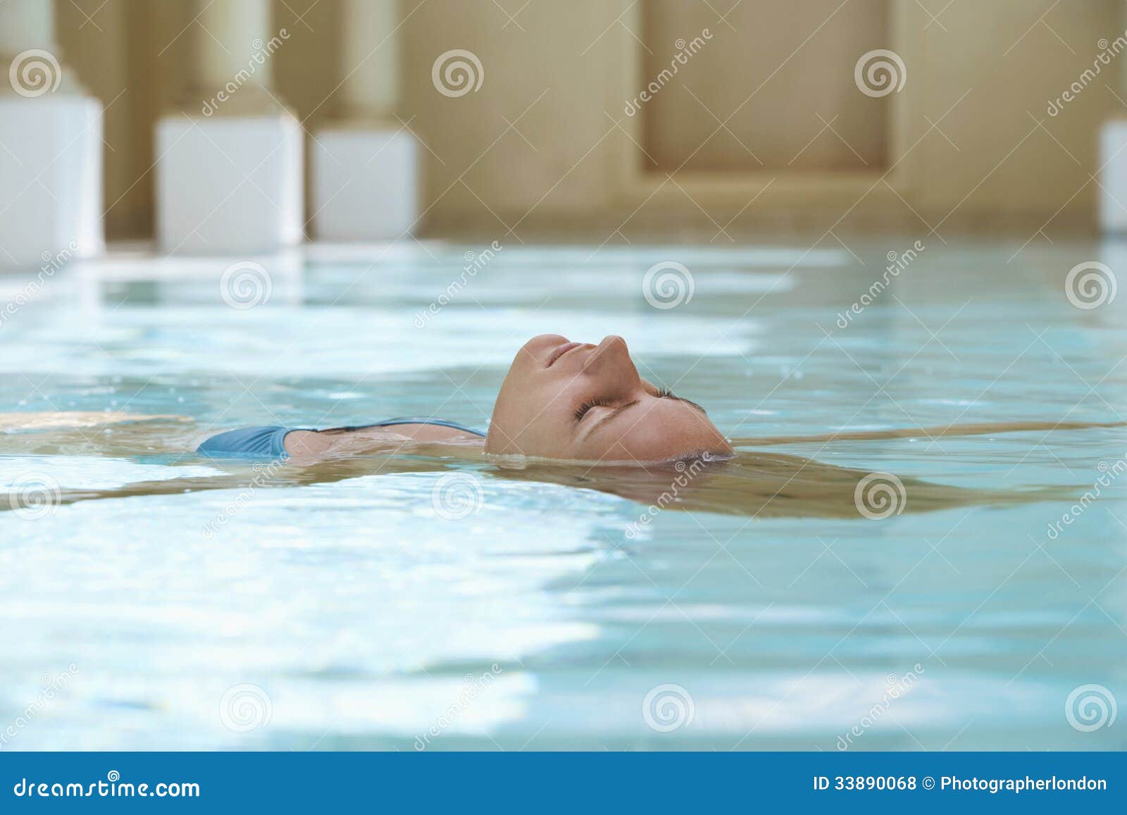 Woman Floating in Swimming Pool Stock Photo - Image of leisure ...