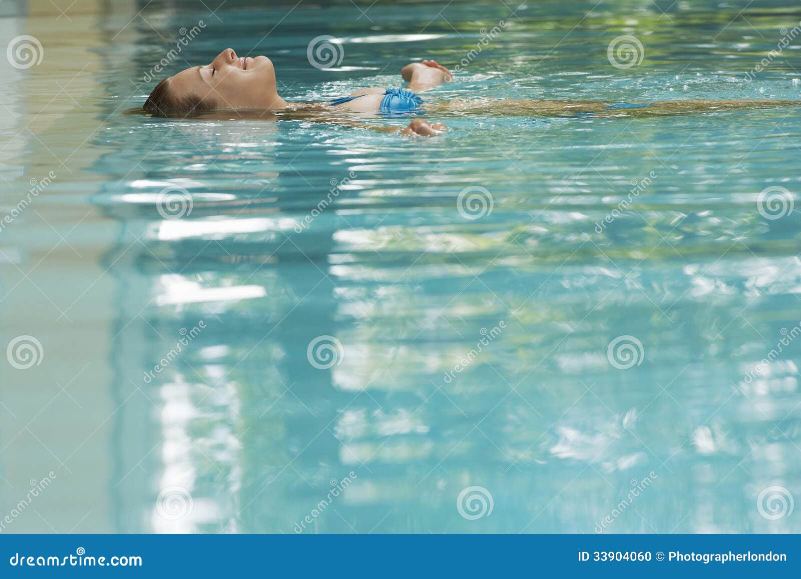 Person Floating On Water