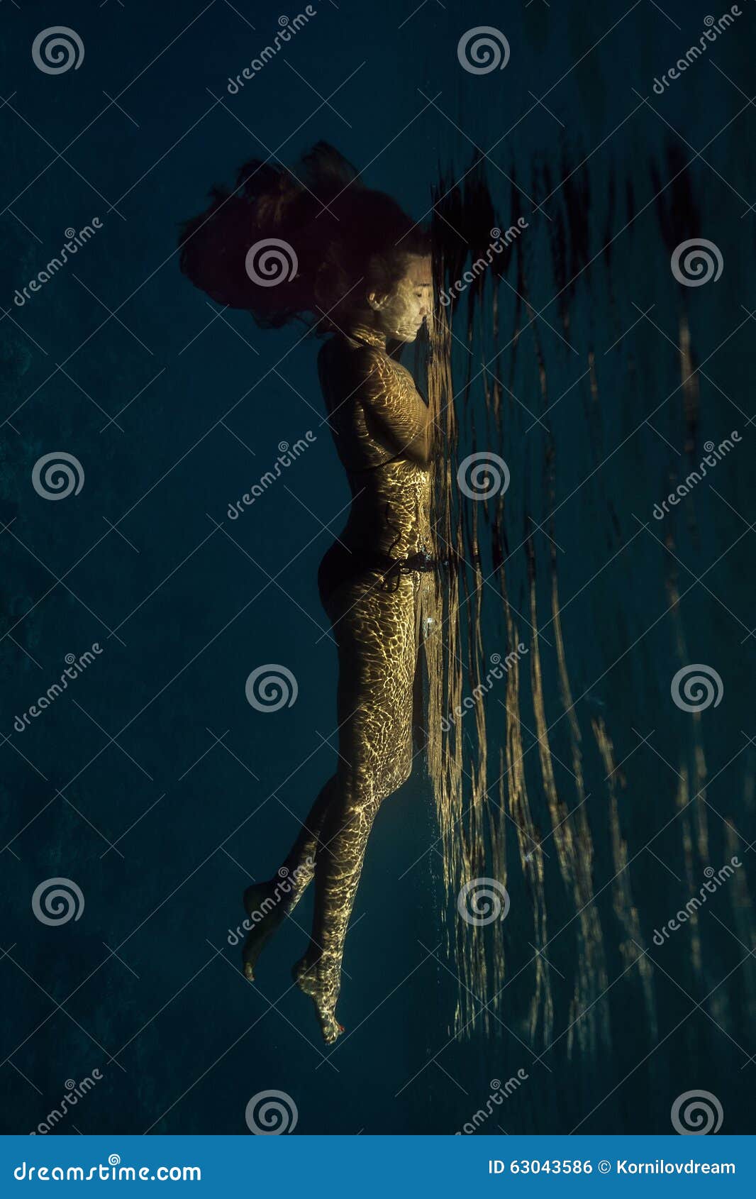 Woman floating underwater stock photo. Image of pretty - 63043586