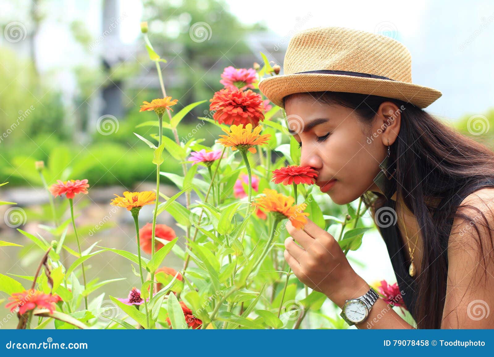 Woman with flowers stock photo. Image of garden, female - 79078458
