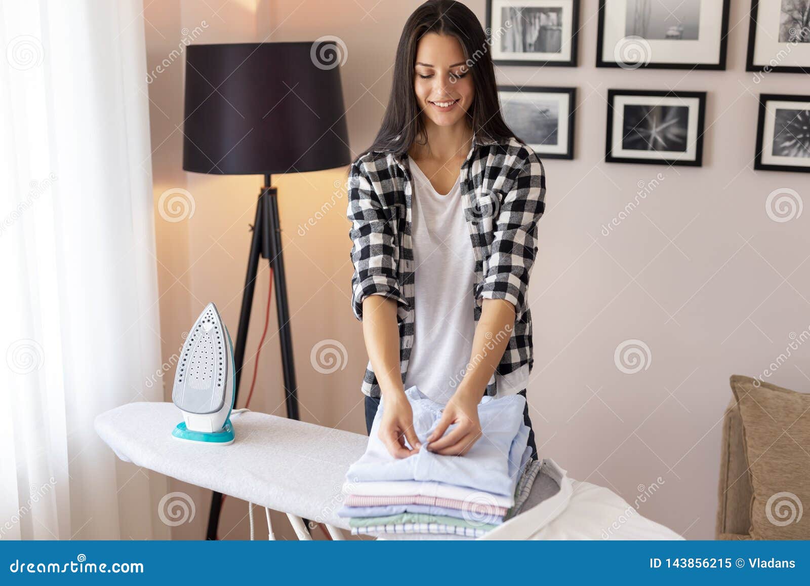Woman Folding Clean Clothes Stock Image - Image of hired, housework ...