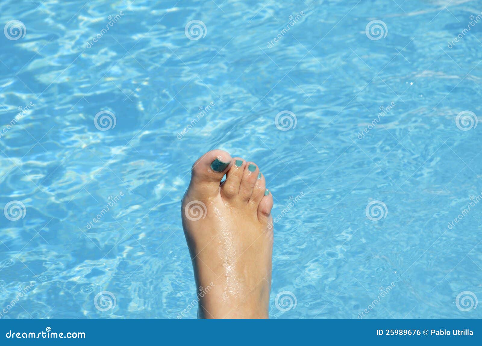 Woman foot with blue nails stock photo. Image of body - 25989676