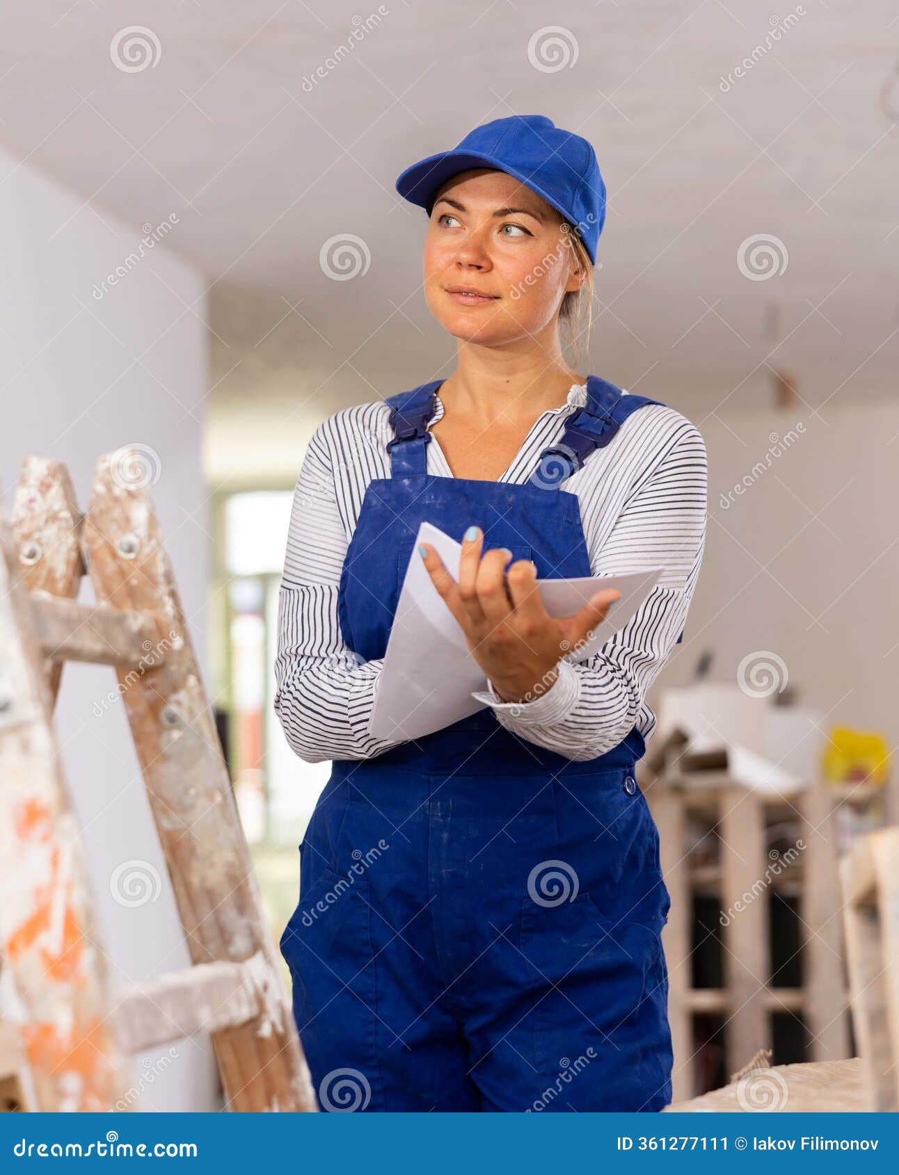 Woman Foreman Checks the Completed Construction Work on Drawing Stock ...