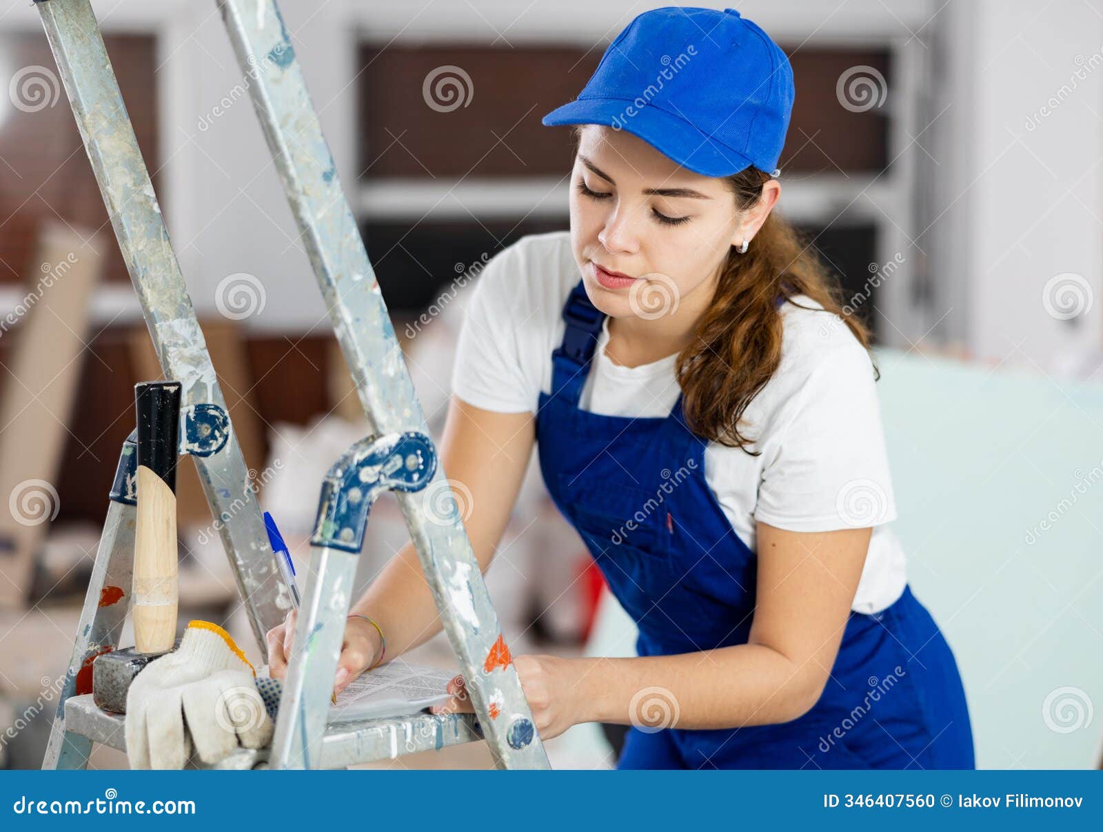 Woman Foreman Signs an Act of Acceptance of Completed Work Stock Photo ...