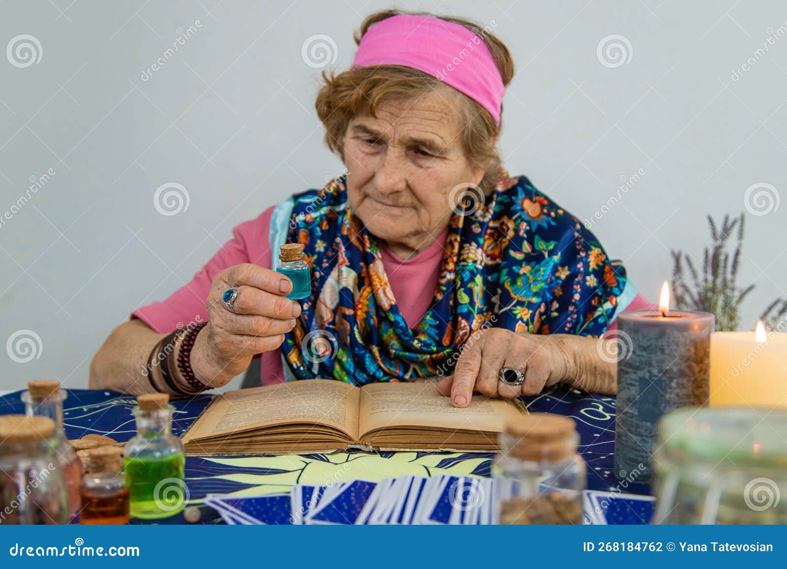 Woman Fortune Teller Prepares a Potion. Selective Focus Stock Photo ...