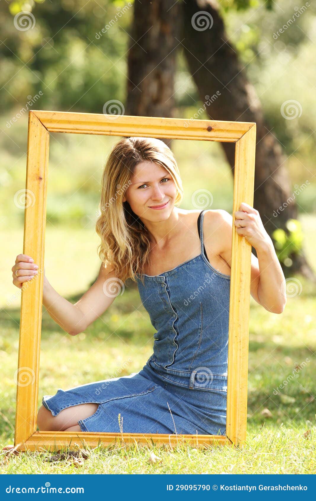 Woman in a frame stock photo. Image of camera, shooting - 29095790