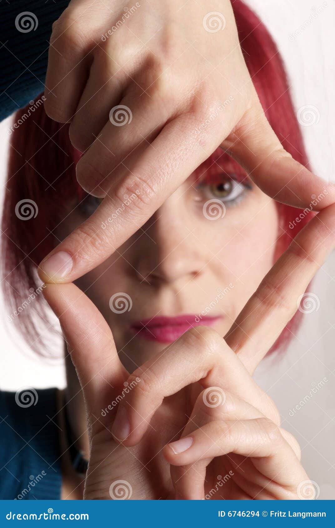 Woman Framing Face with Fingers Stock Photo - Image of frames, hair ...
