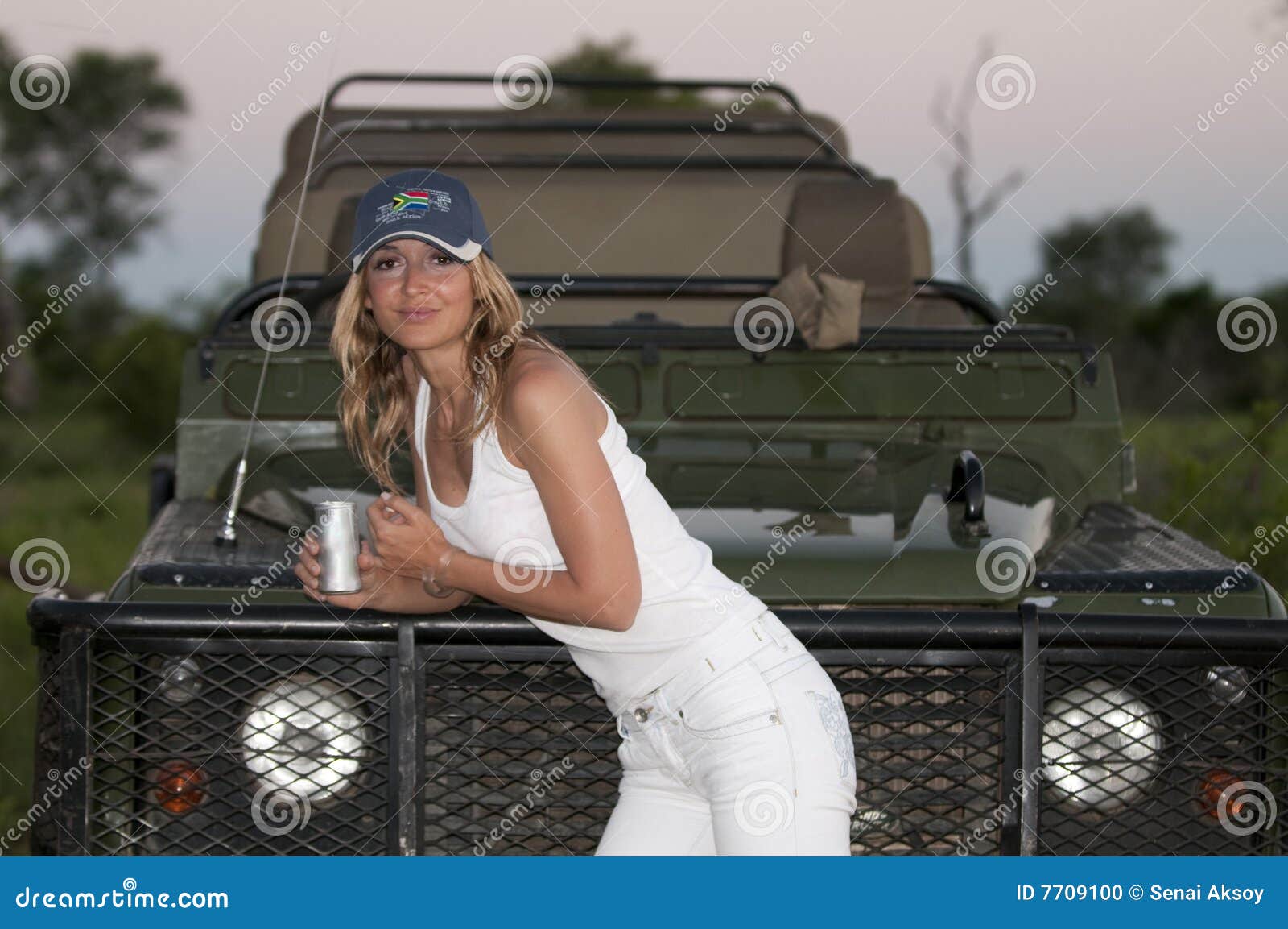 Woman in Front of a 4x4 Land Vehicle Stock Photo - Image of african ...