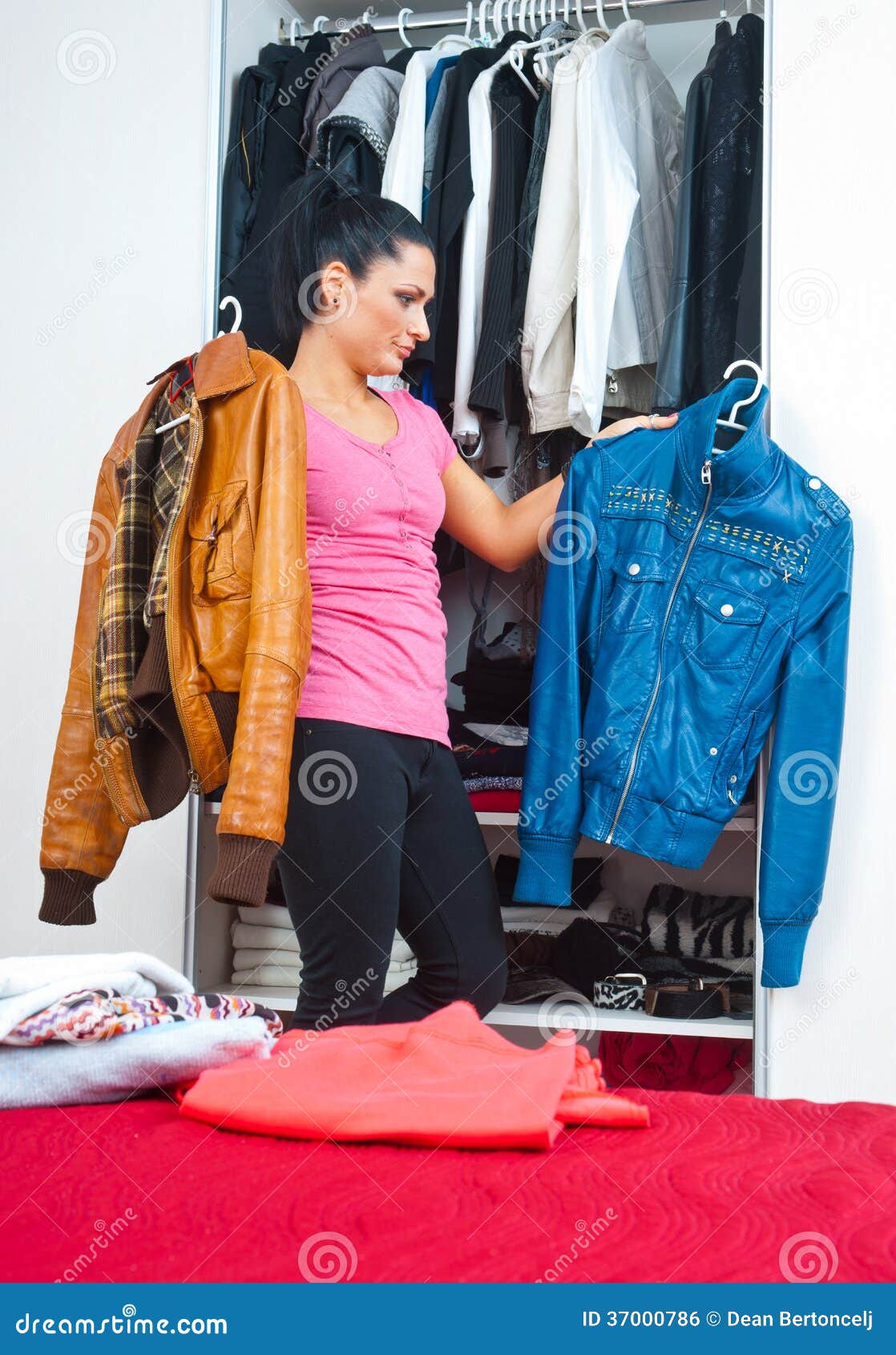 Woman in Front of Closet Full of Clothes Stock Photo - Image of clothes ...
