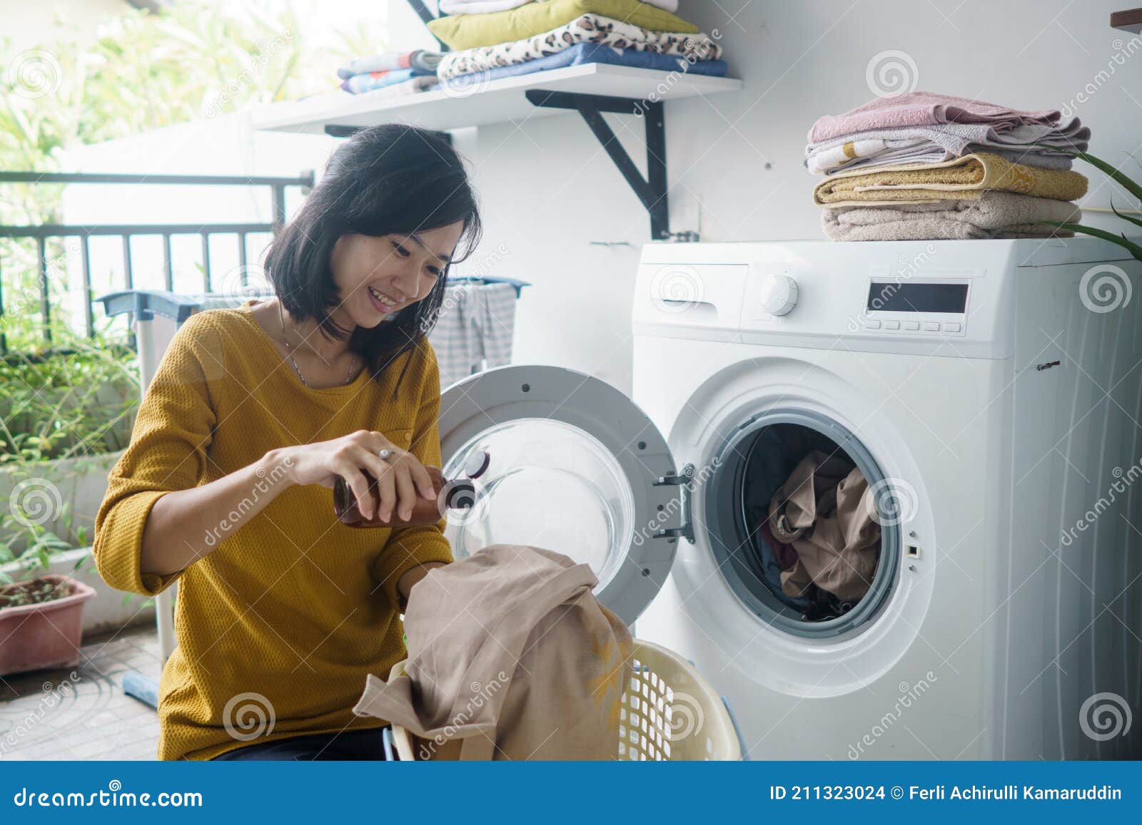 Woman in Front of the Washing Machine Stock Photo - Image of cleaning ...