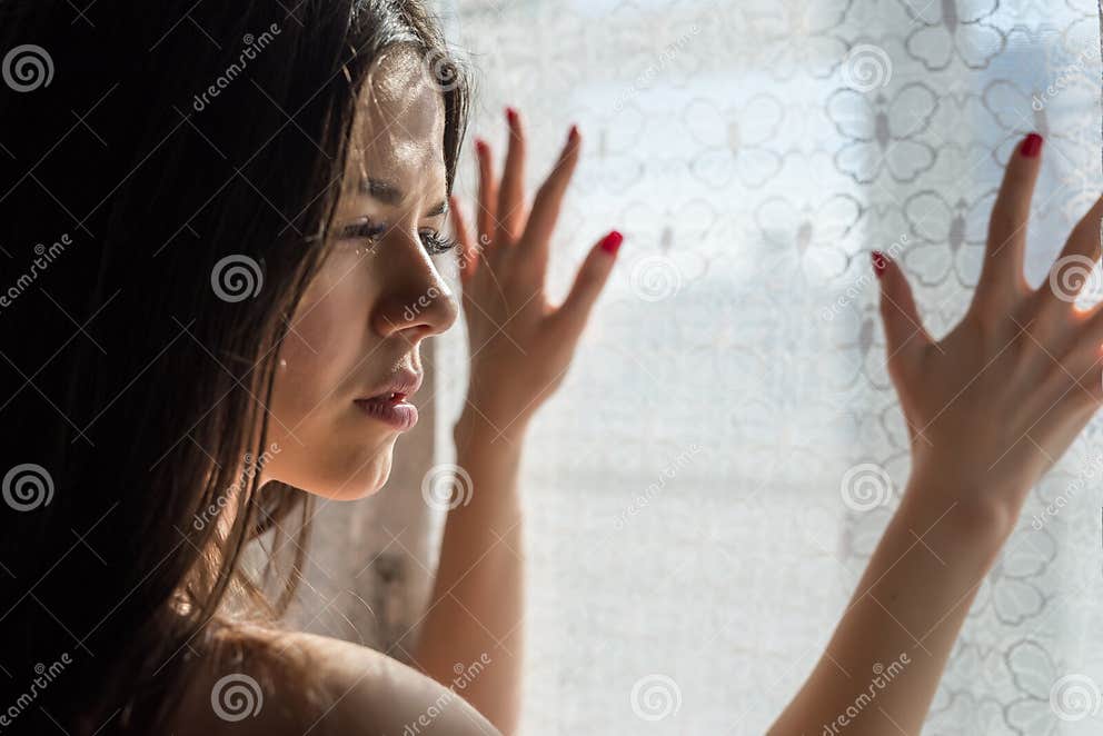 Woman in Front of Window. the First Rays of the Sun Stock Photo - Image ...