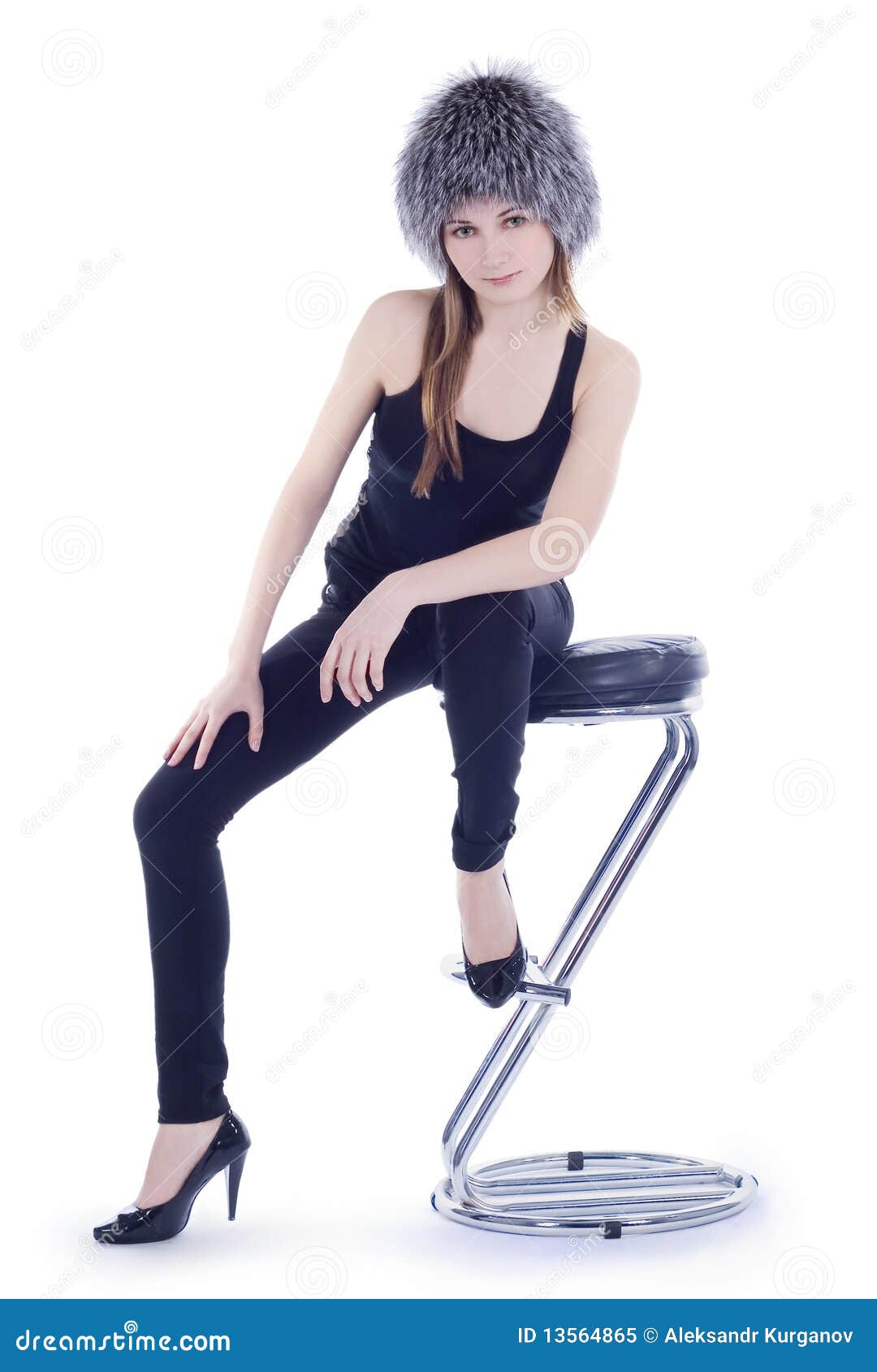 Woman in Fur Cap Sitting on the Chair Stock Image - Image of model ...