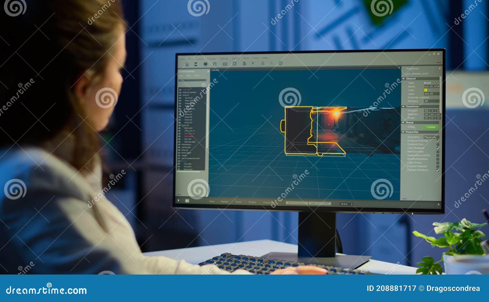 Woman Game Designer Looking at Computer Screen Working Late Night Stock ...