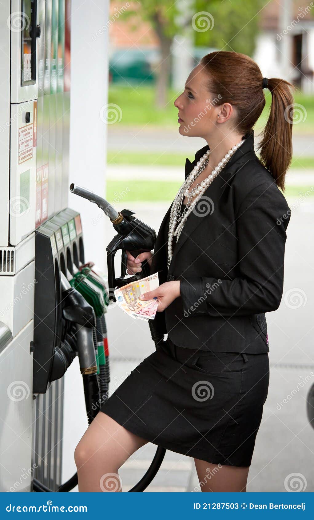 Woman at gas station stock image. Image of attractive - 21287503