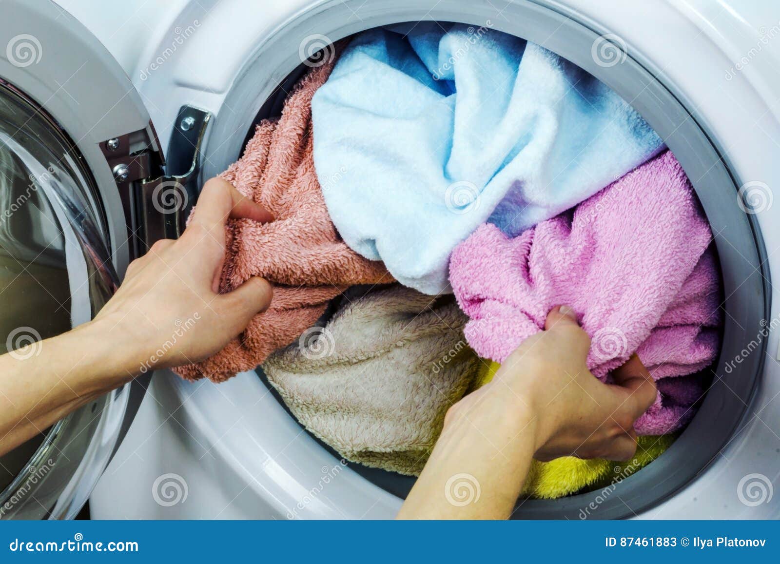 Woman Gets Clothes from the Washing Machine Stock Image - Image of ...