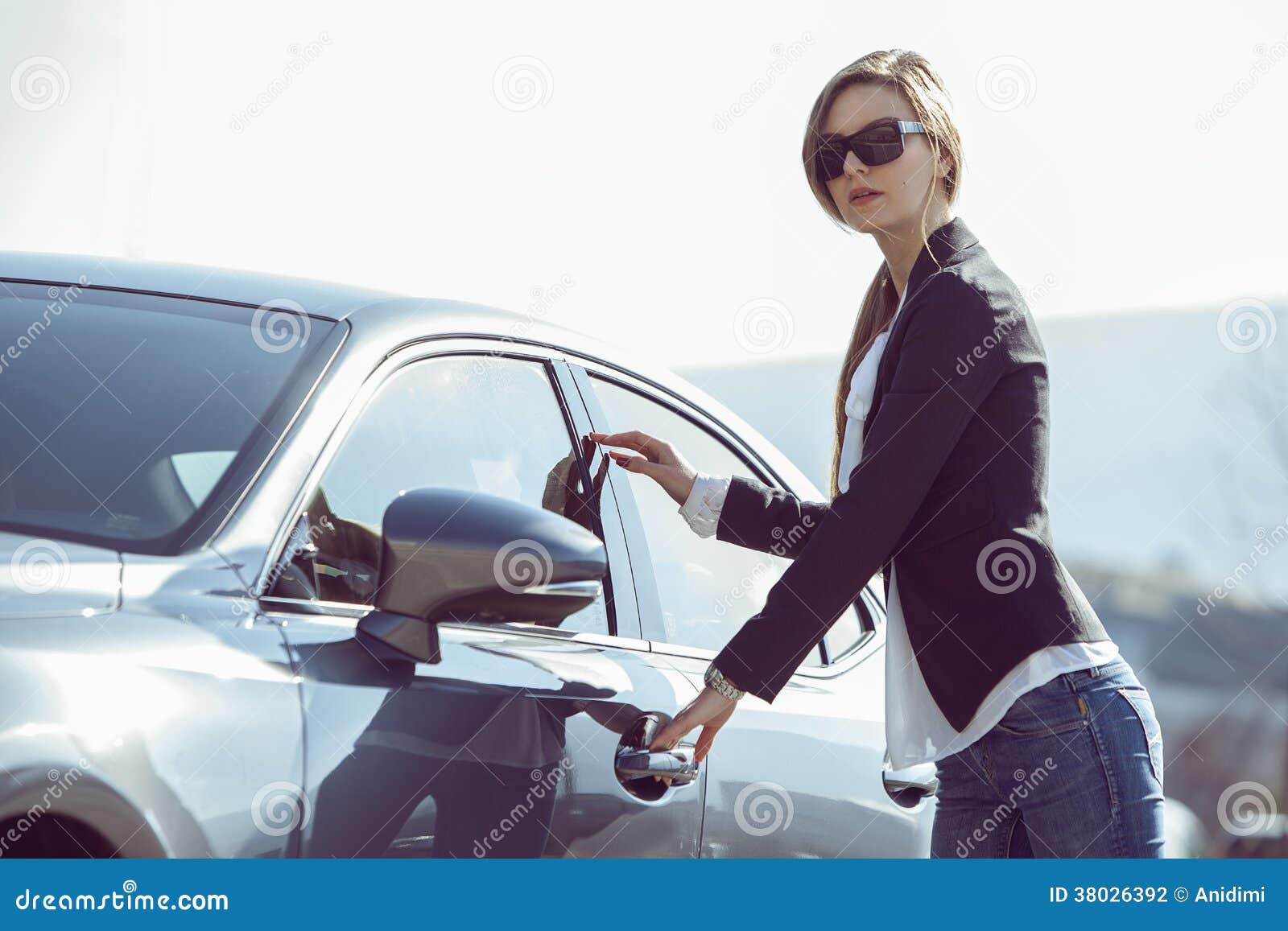 Woman getting in a car stock photo. Image of female, business - 38026392
