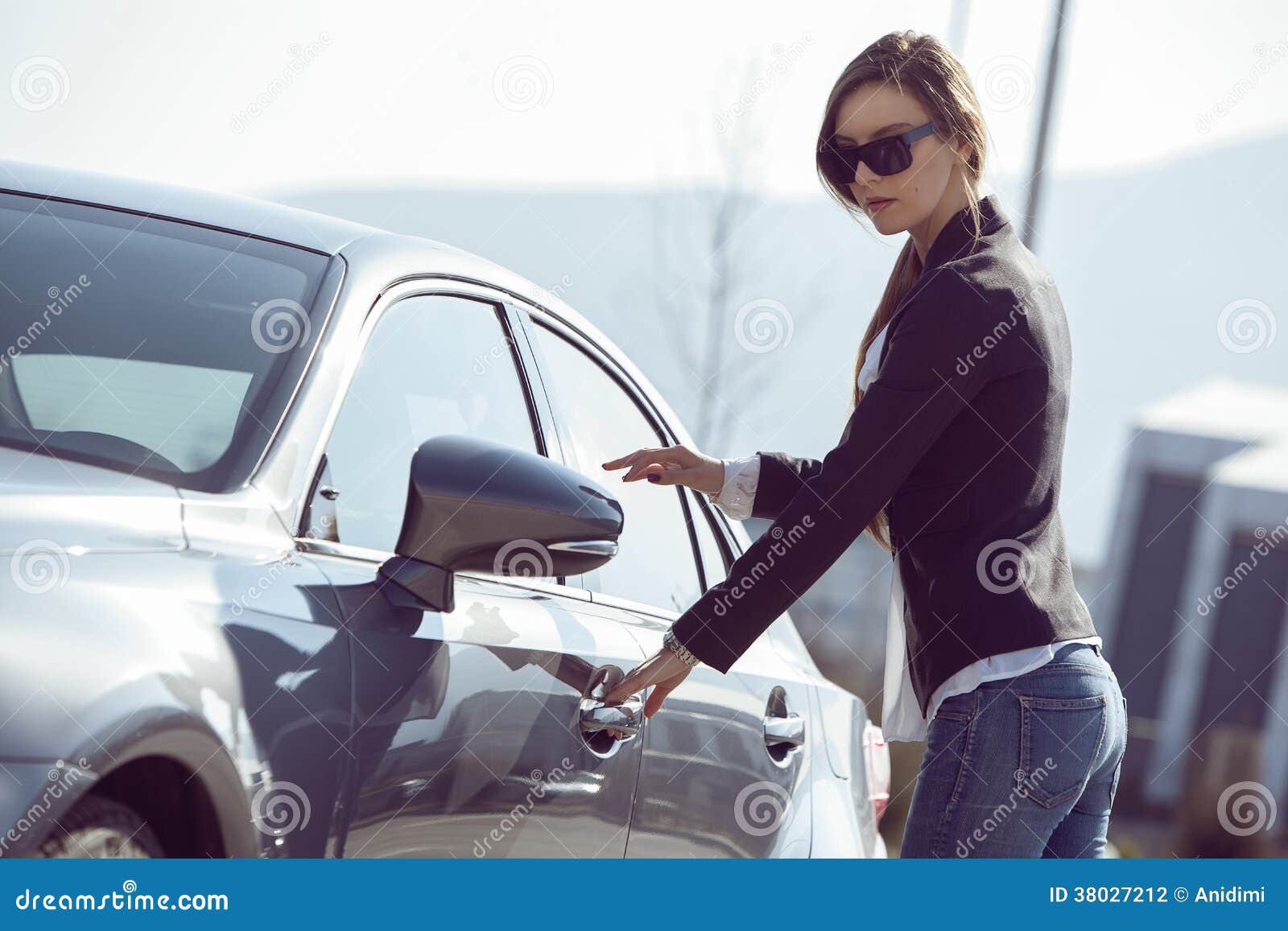 Woman getting in a car stock photo. Image of lifestyle - 38027212