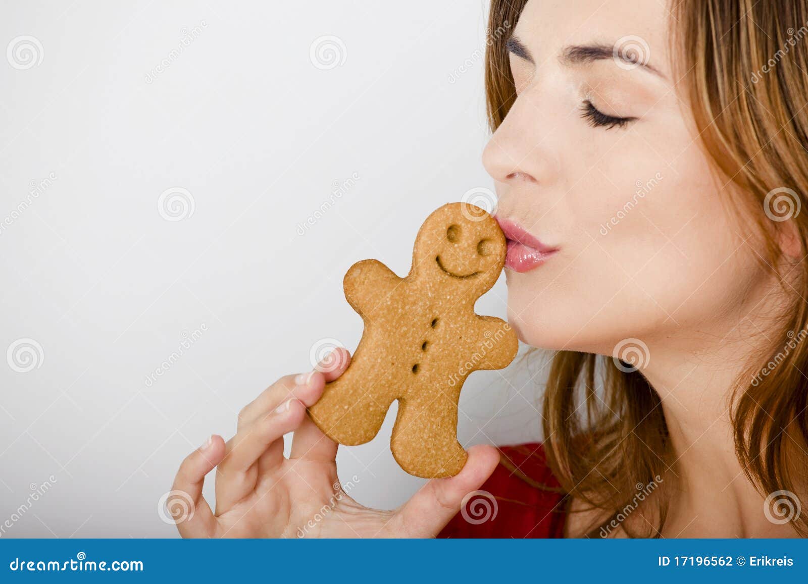 Woman with a Gingerbread Cookie Stock Photo - Image of fresh, holding ...