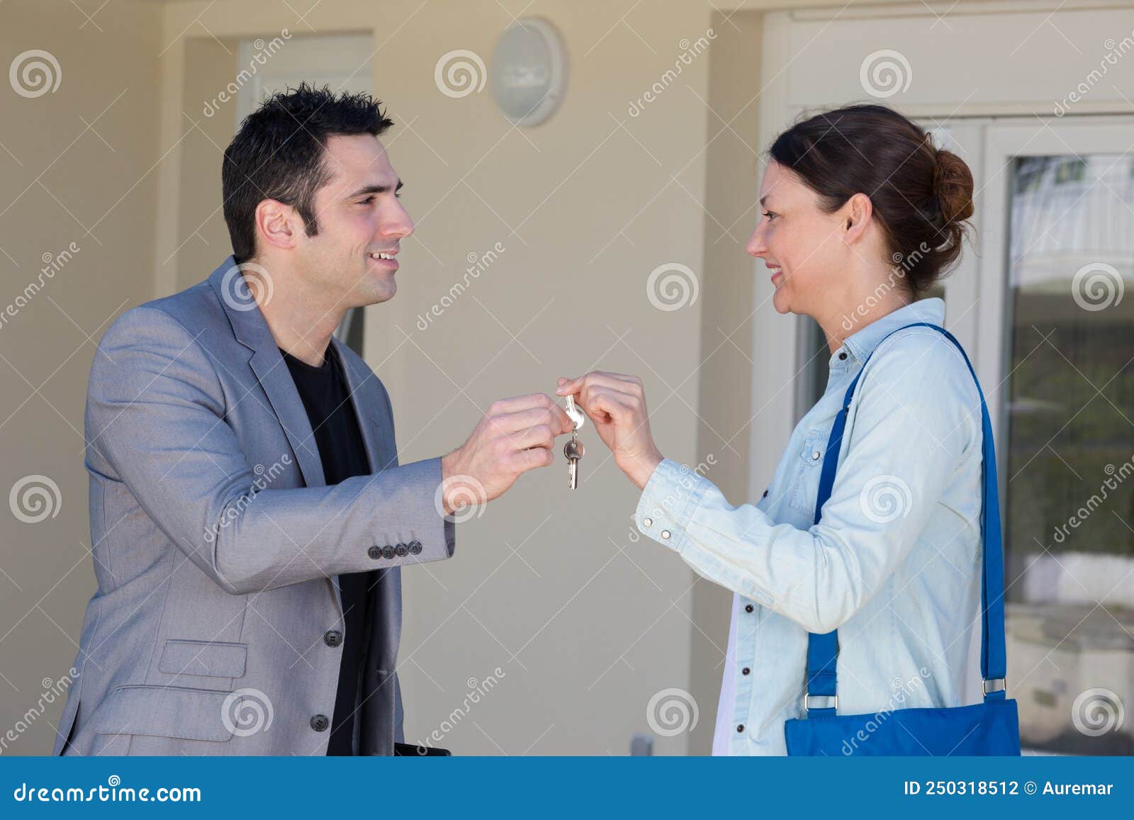Woman giving back key stock photo. Image of interior - 250318512