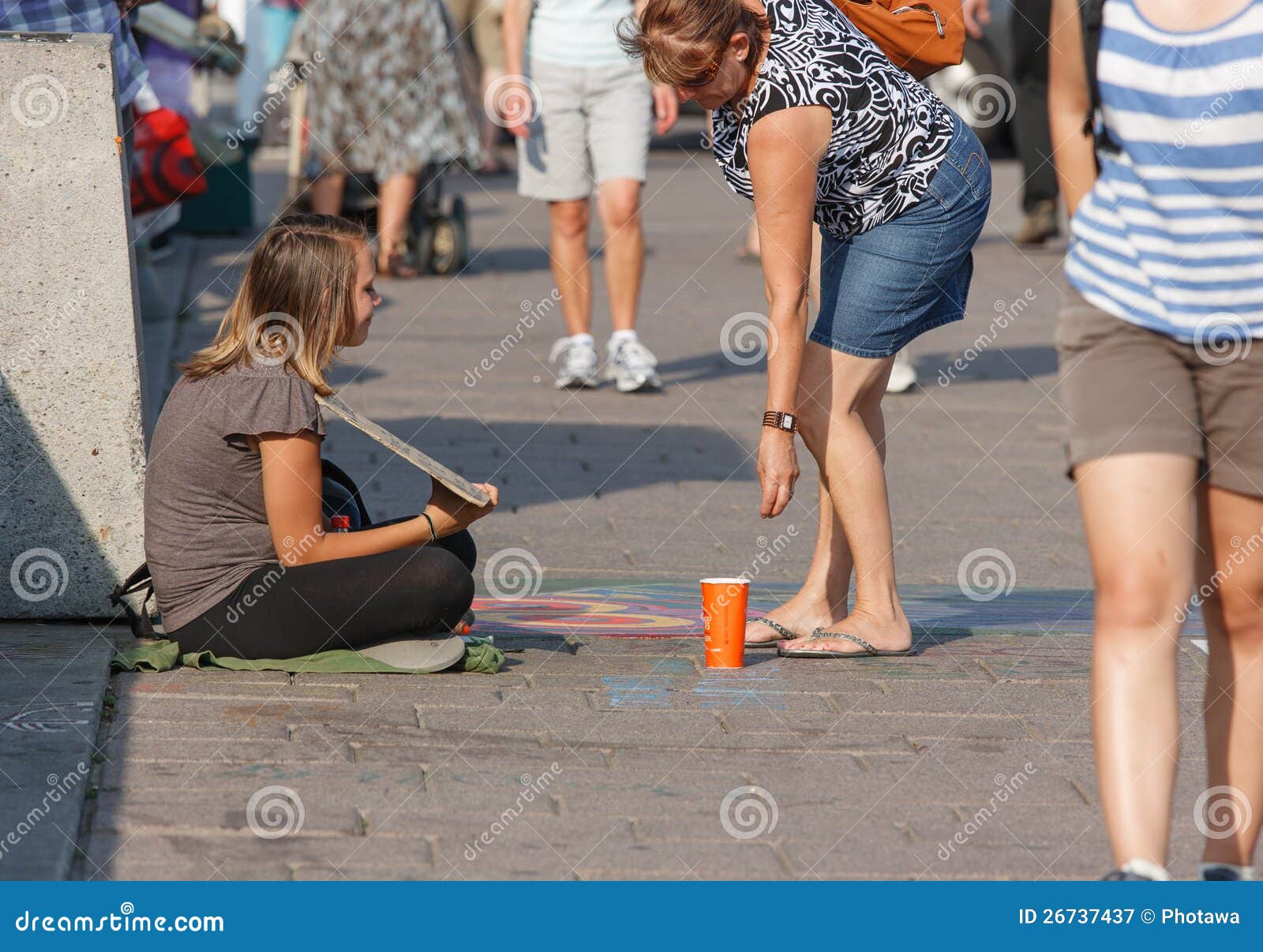 Woman Giving to Panhandler editorial photography. Image of canada ...