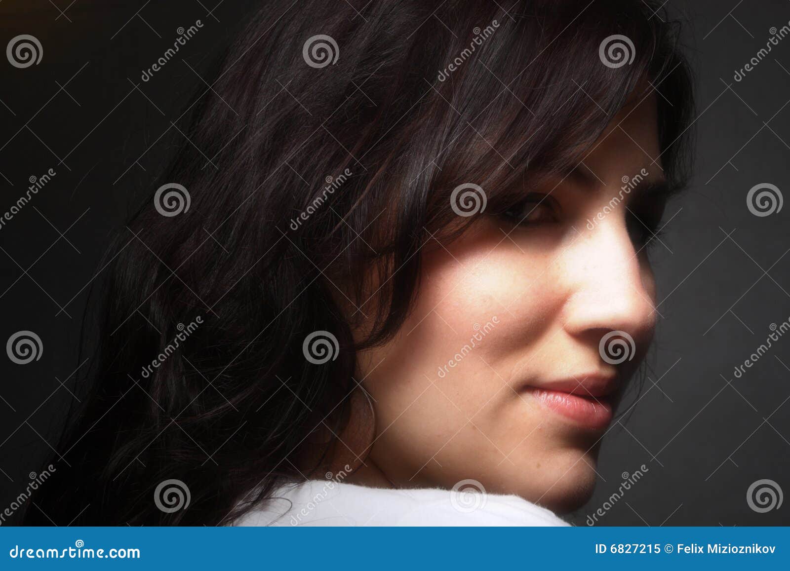 Woman Glancing at the Camera Stock Image - Image of headshot, sideways ...