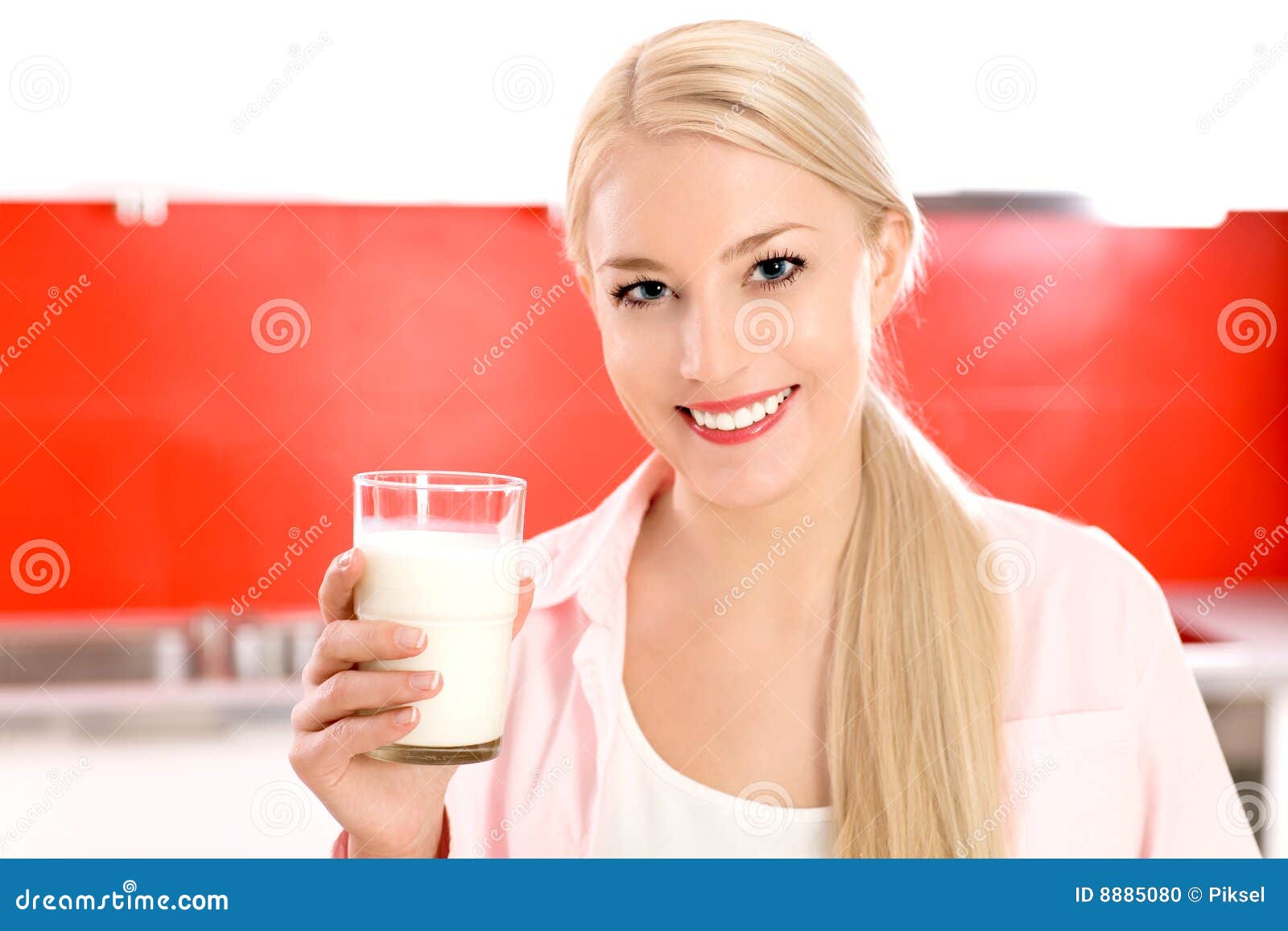 Woman with glass of milk stock photo. Image of health - 8885080