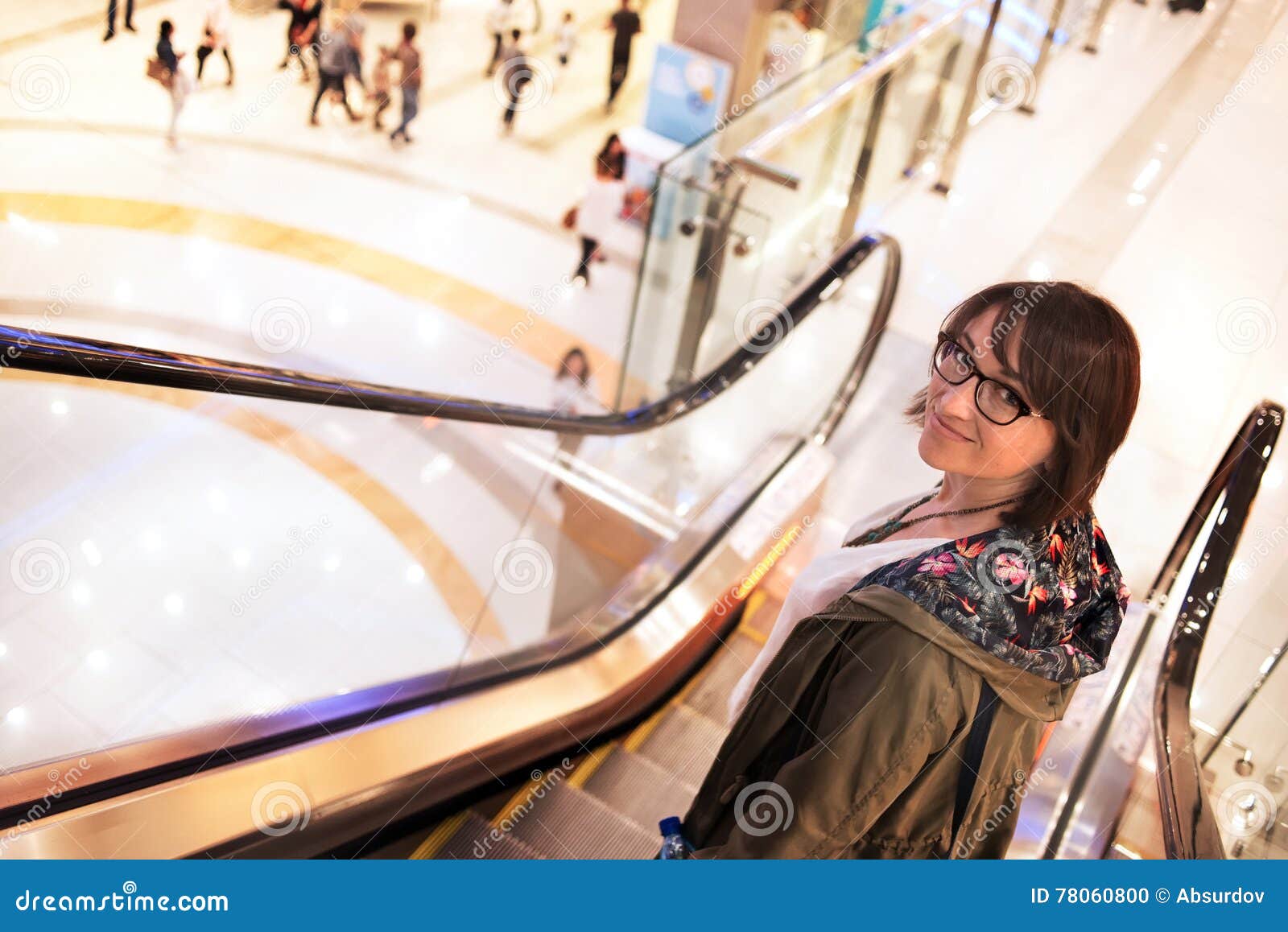Woman with Glasses Rides on the Escalator Stock Photo - Image of girls ...