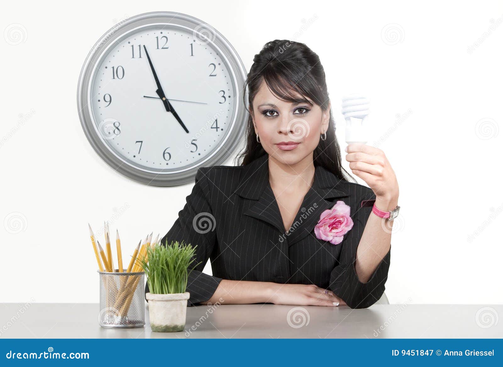 Woman with Glowing Energy Efficient Lightbulb Stock Image - Image of ...