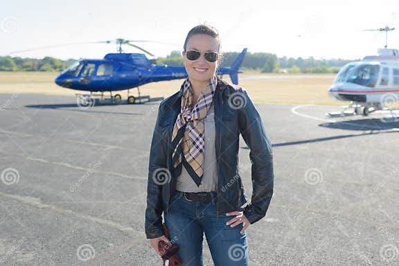 Woman going in helicopter stock photo. Image of person - 291016802